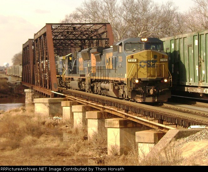 CSX Q300 passes a stopped Q707 east of Port Rdg Jct
